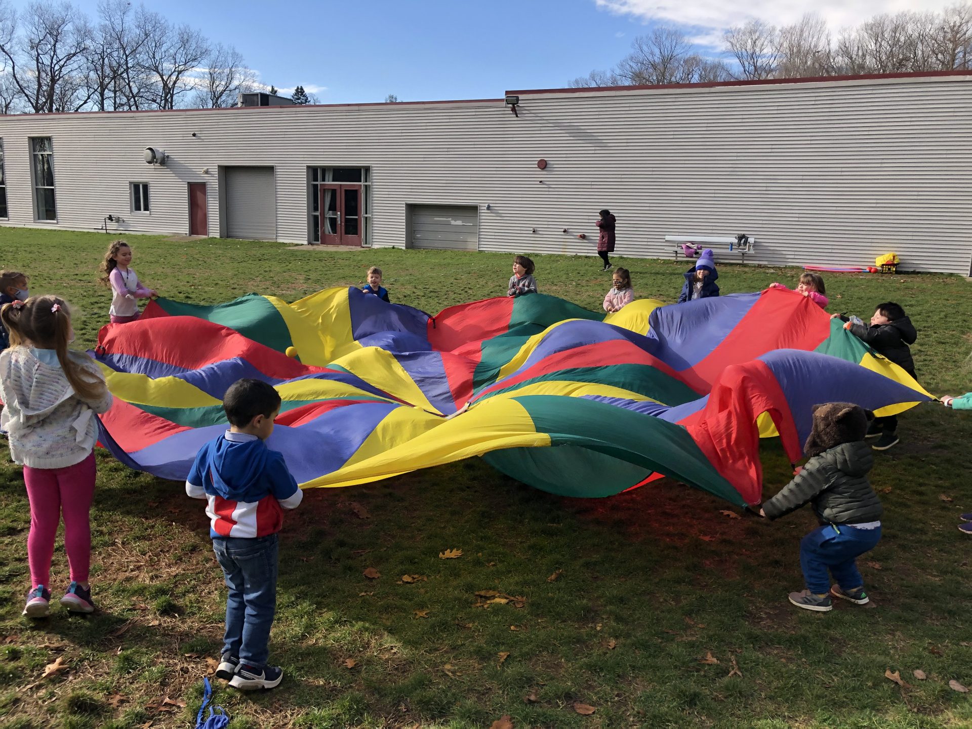 Fraser Woods Montessori School | Parachute Fitness Fun!
