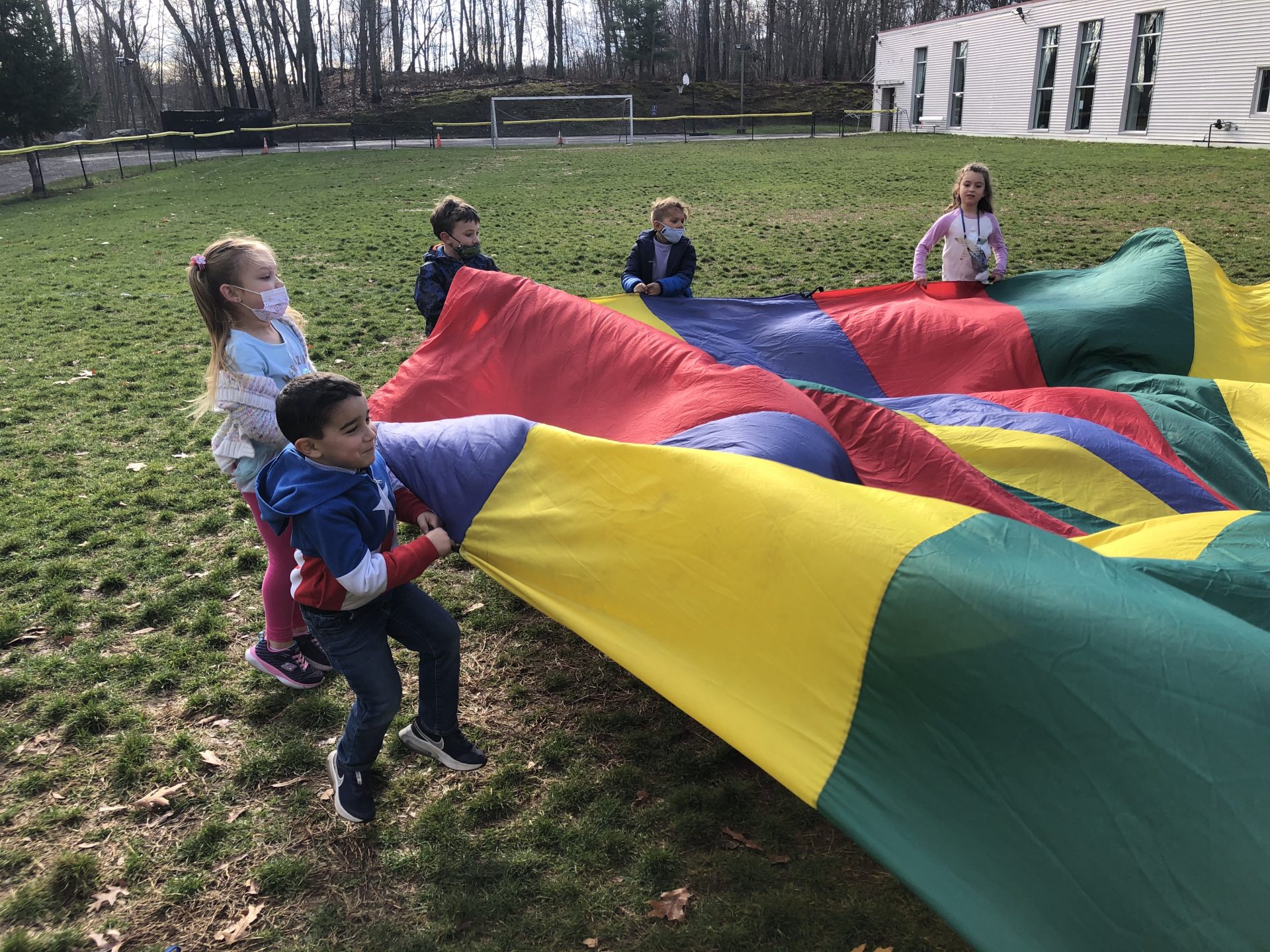 Fraser Woods Montessori School | Parachute Fitness Fun!